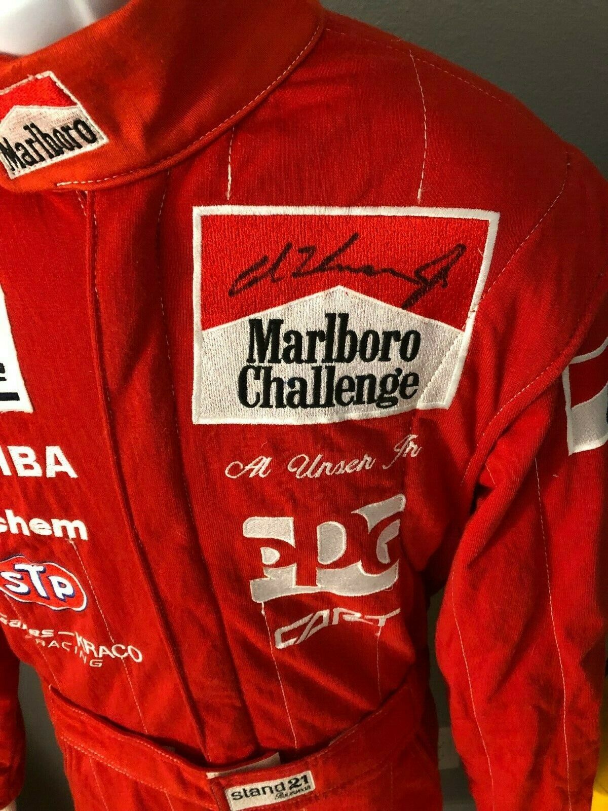 AL UNSER JR, RACE USED/WORN, 1990 MARLBORO CHALLENGE DRIVERS SUIT, HAND ...